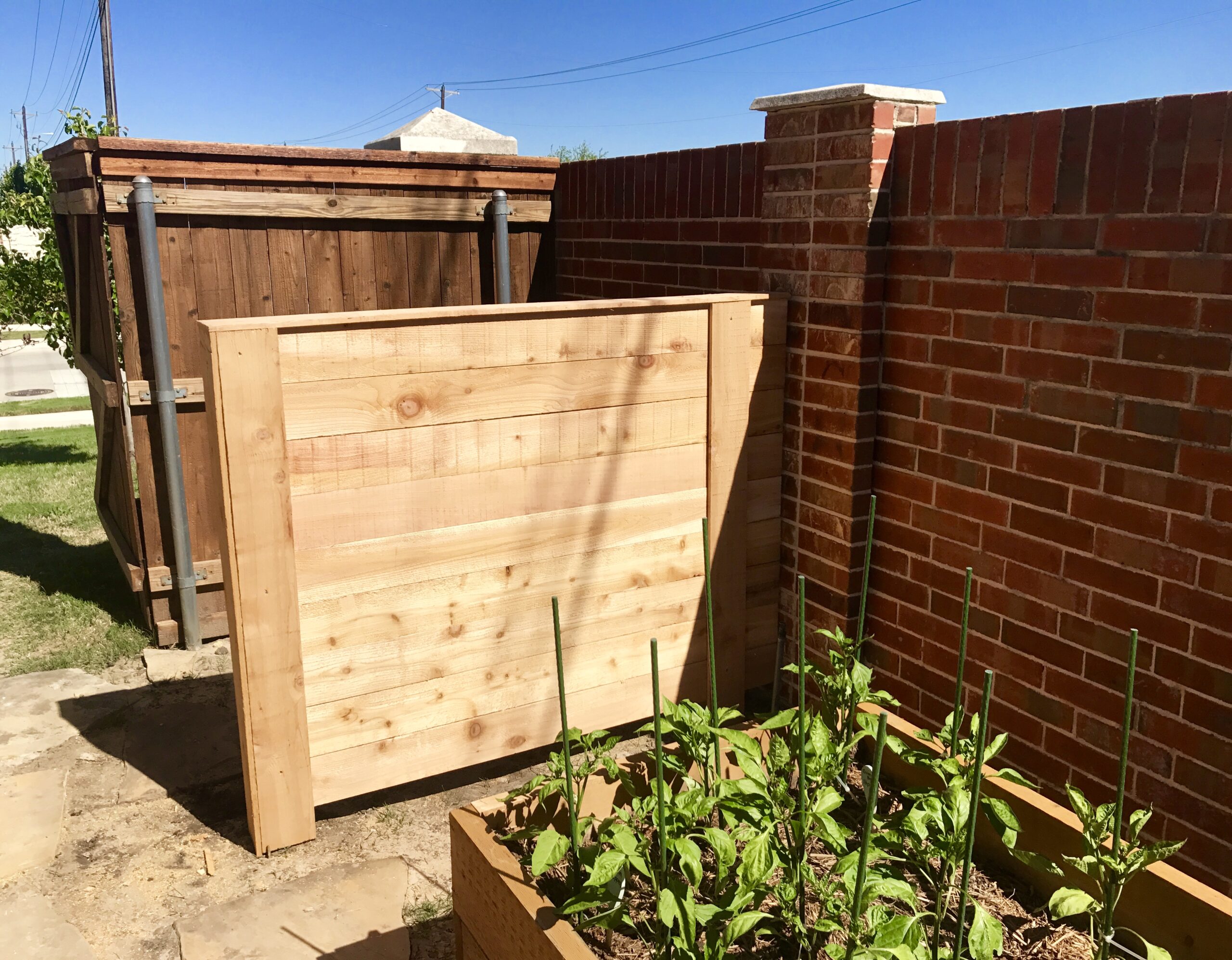 HOW TO BUILD A TRASH CAN SCREEN OUT OF FENCE BOARDS | Everyday Laura